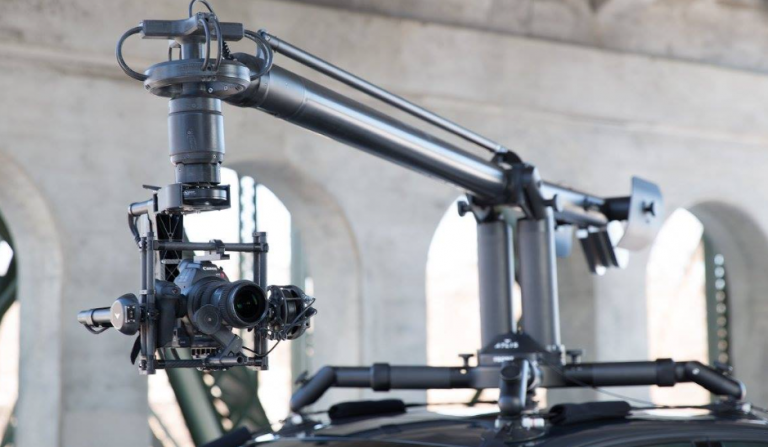 MotoCrane: a universal automotive camera crane system that can be set ...