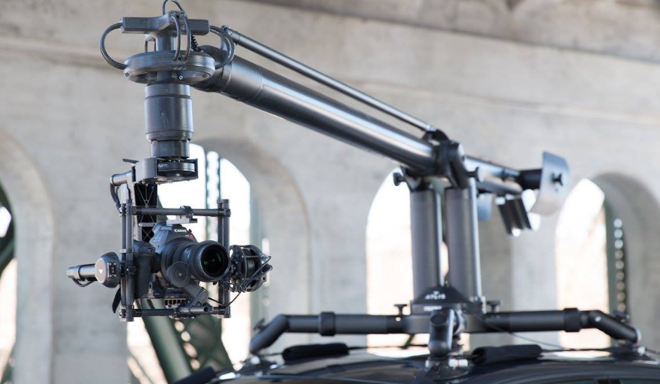 MotoCrane: a universal automotive camera crane system that can be set ...